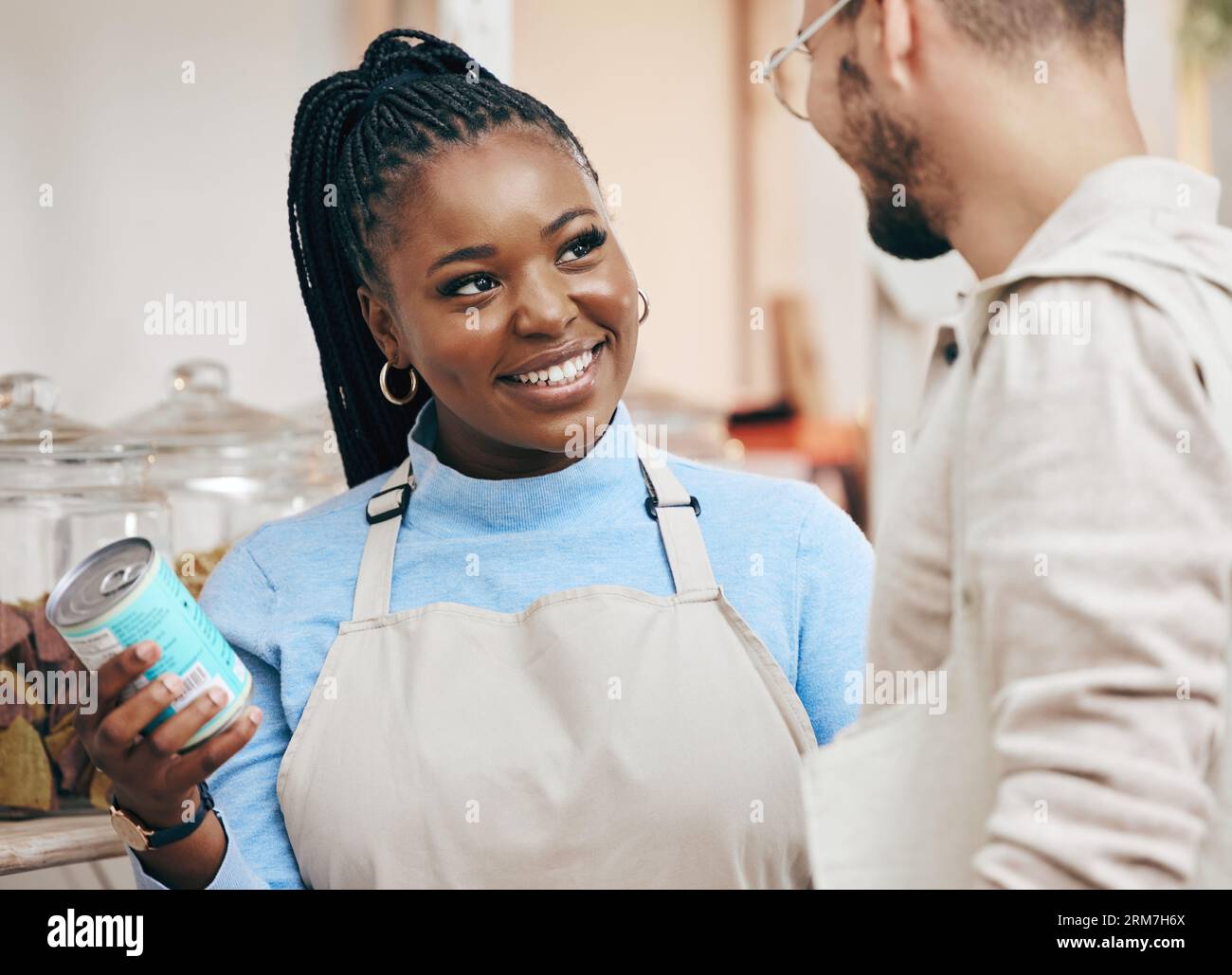 Woman, helping and customer with product in store with question ...