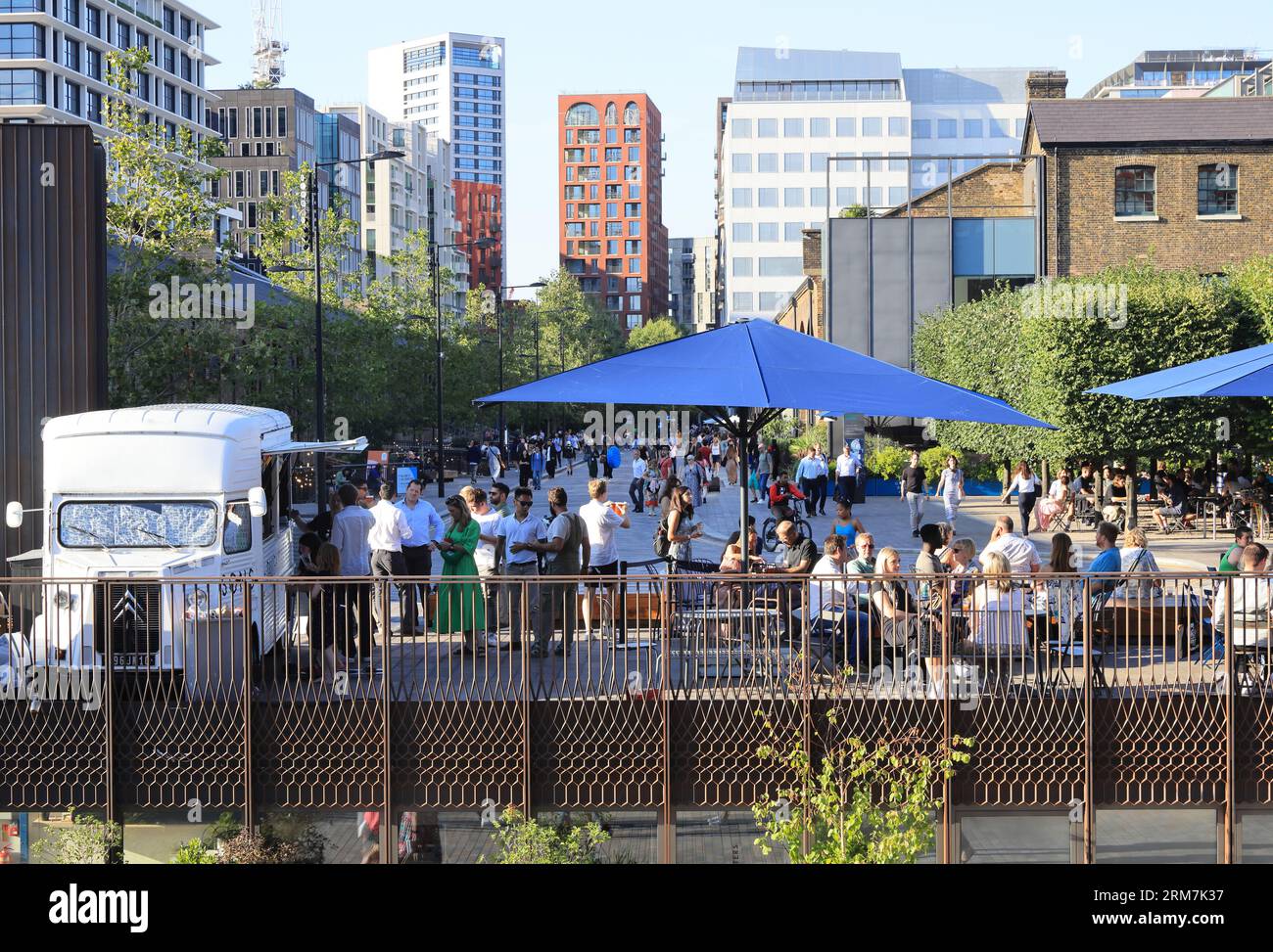 A busy summer's day on Granary Square, with Stable Street beyond, at ...