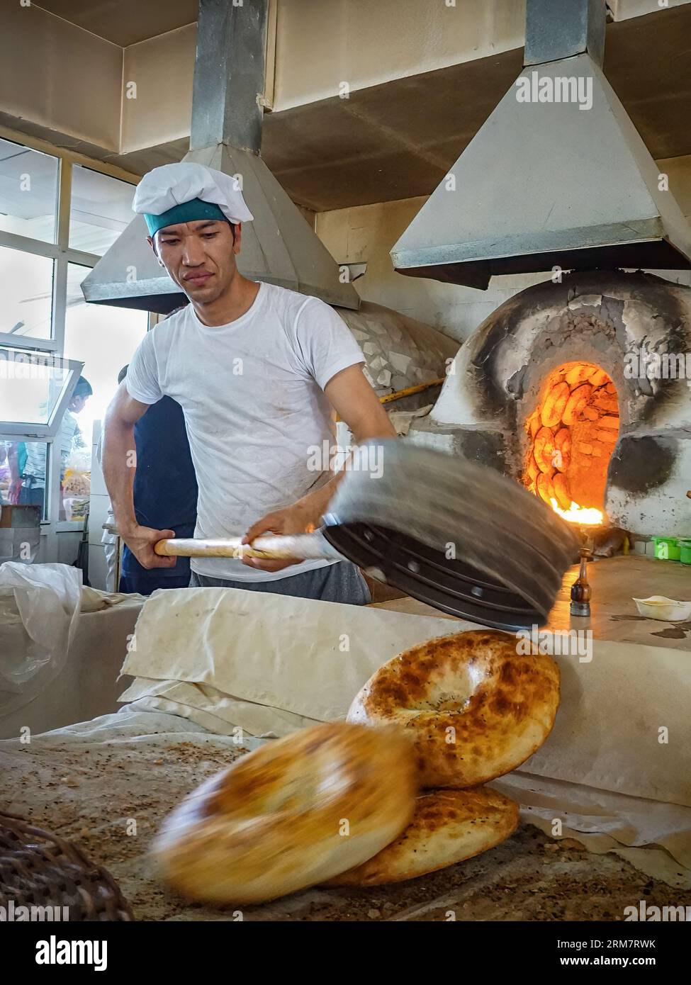 Tashkent, Uzbekistan. 4th June, 2019. A chef seen removing freshly ...