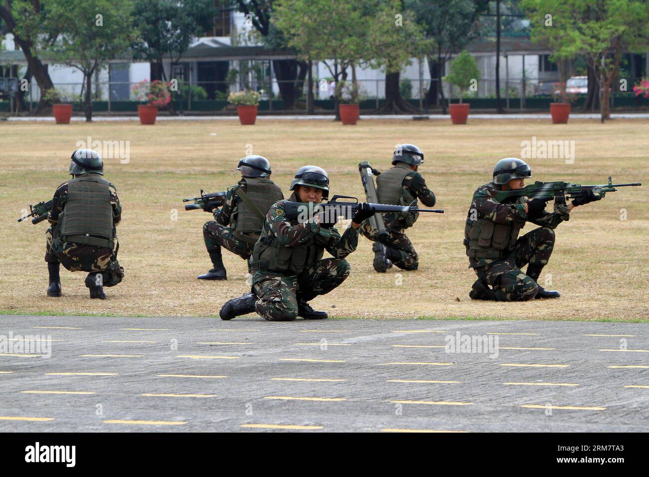Soldiers from the Armed Forces of the Philippines (AFP) participate in ...