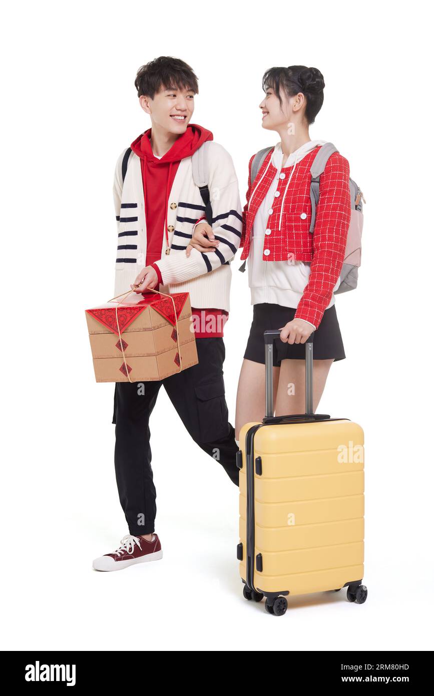Happy young couple going home to celebrate Chinese new year Stock Photo ...