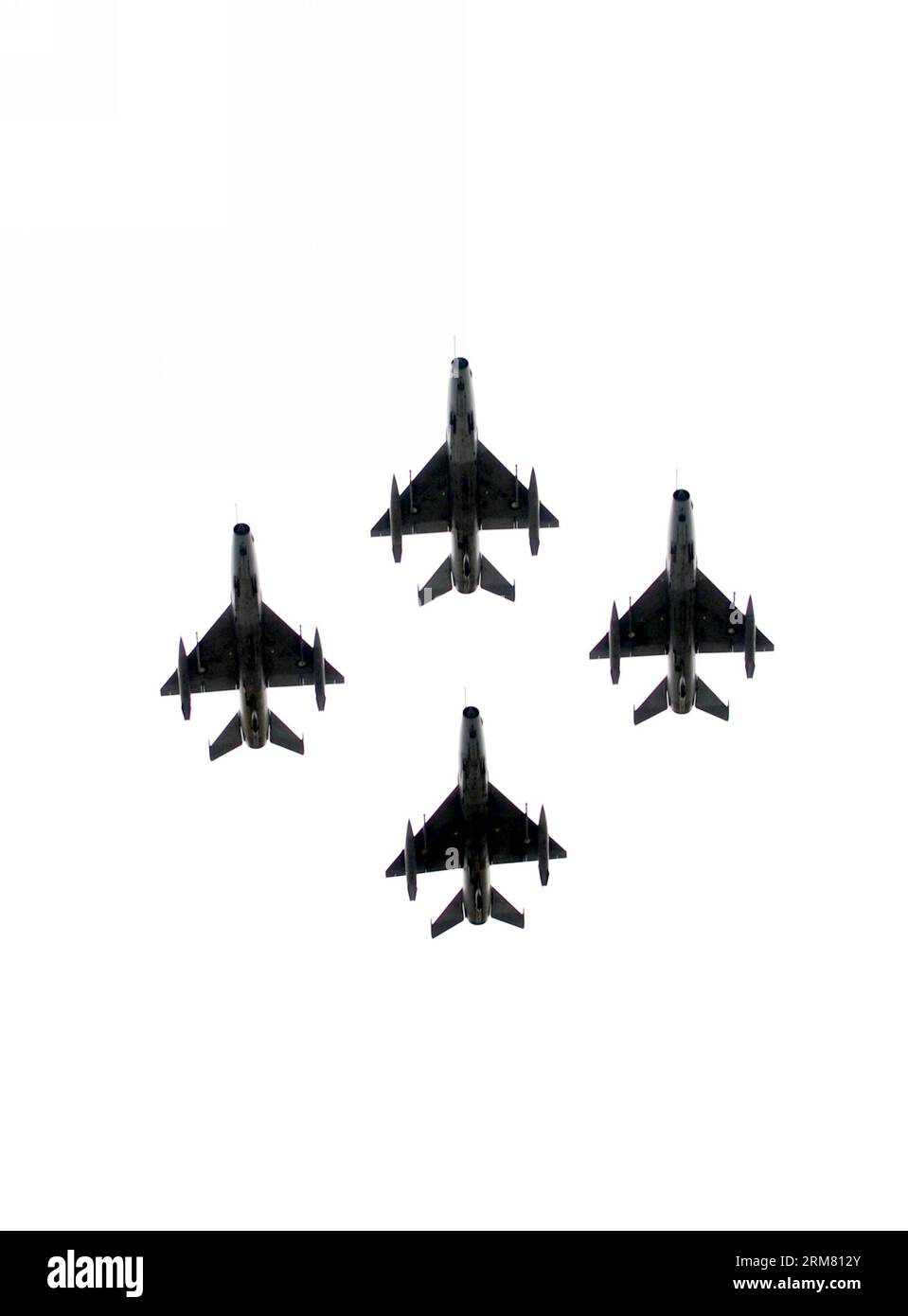 Pakistani Air Force Chengdu F-7 jet fighters fly in formation during a ...