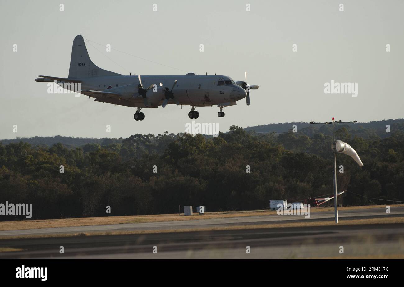 A Japanese P3 Orion aircraft lands at the Royal Australian Air Force ...