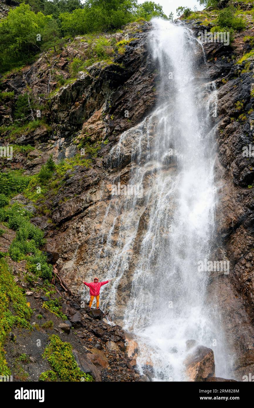 Man standing under waterfall hi-res stock photography and images - Alamy