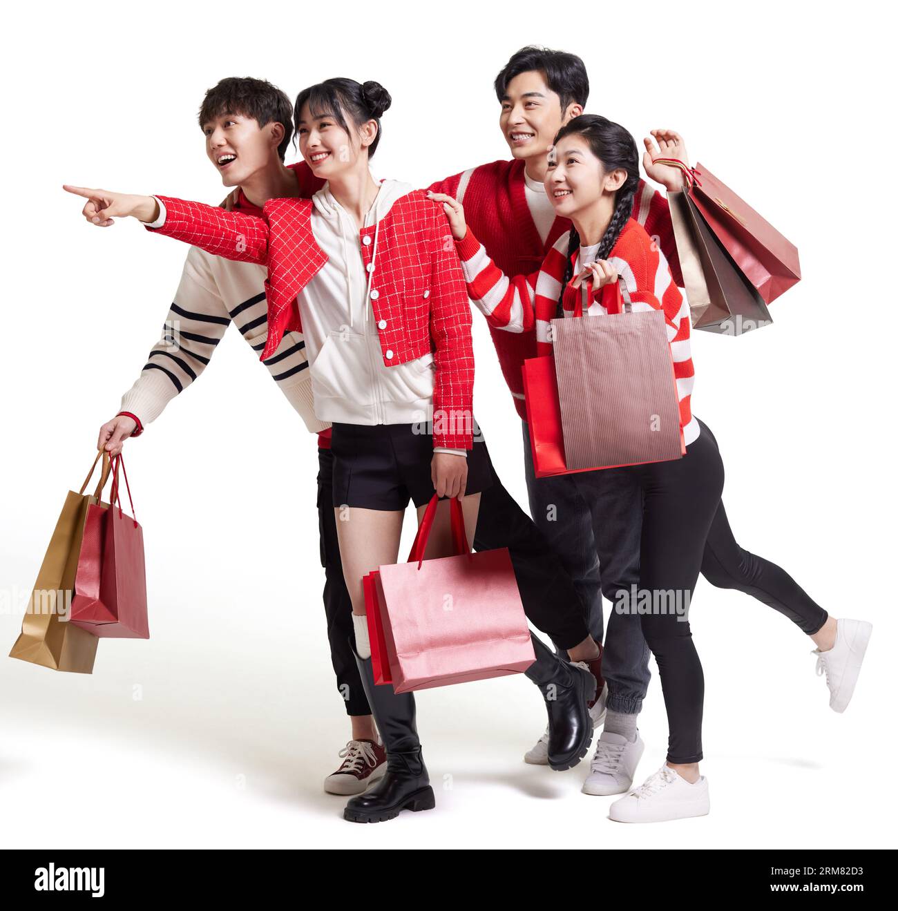 Four friends shopping Cut Out Stock Images & Pictures - Alamy