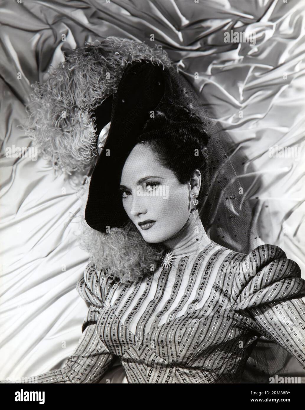MERLE OBERON in TEMPTATION (1946), directed by IRVING PICHEL. Credit ...