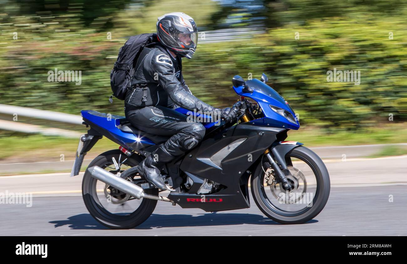Milton Keynes,UK - Aug 23rd 2023. Man riding a Rieju motorcycle on an ...