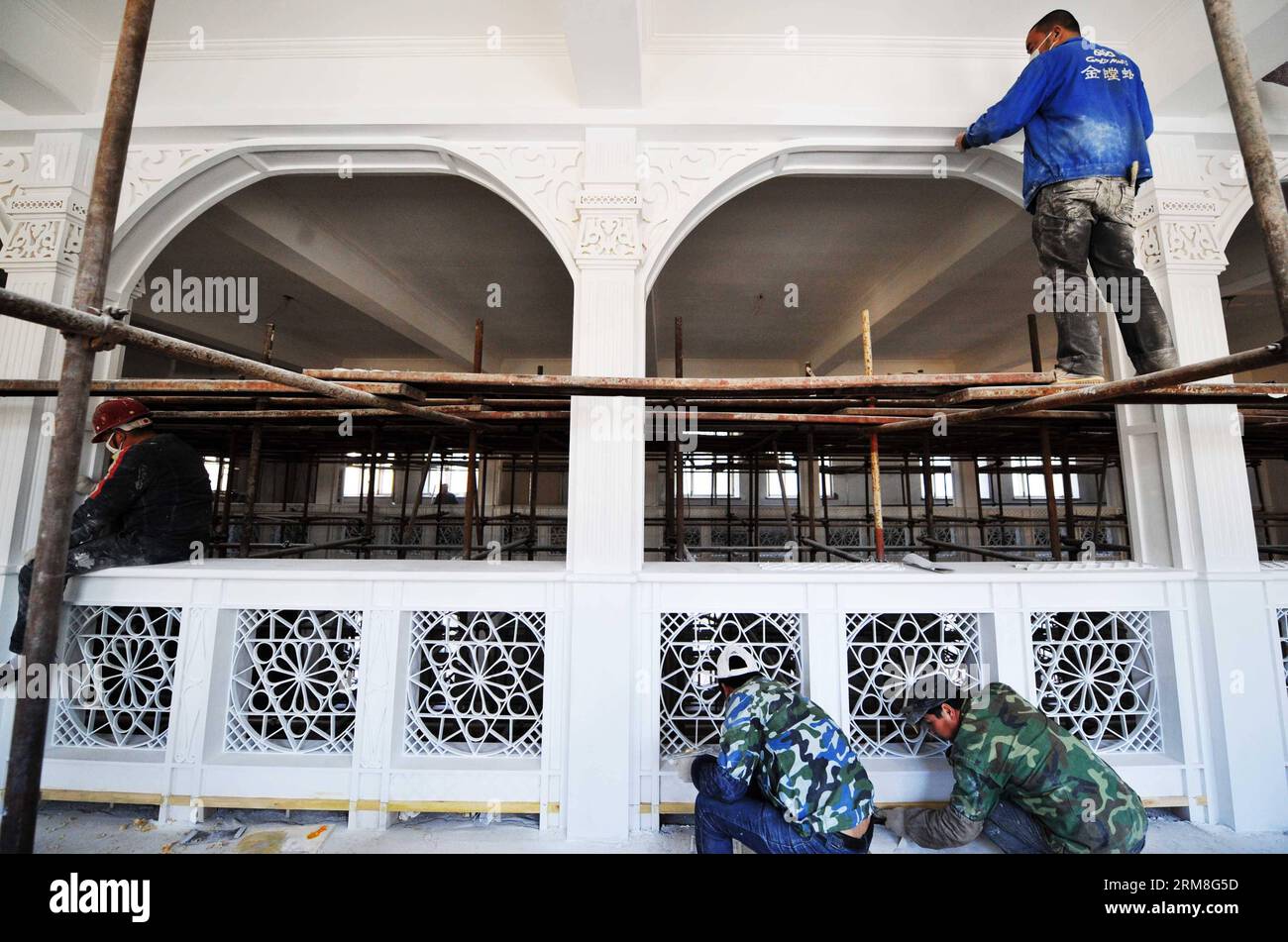 Workers restore the interior of the Old Synagogue in Harbin, capital of ...