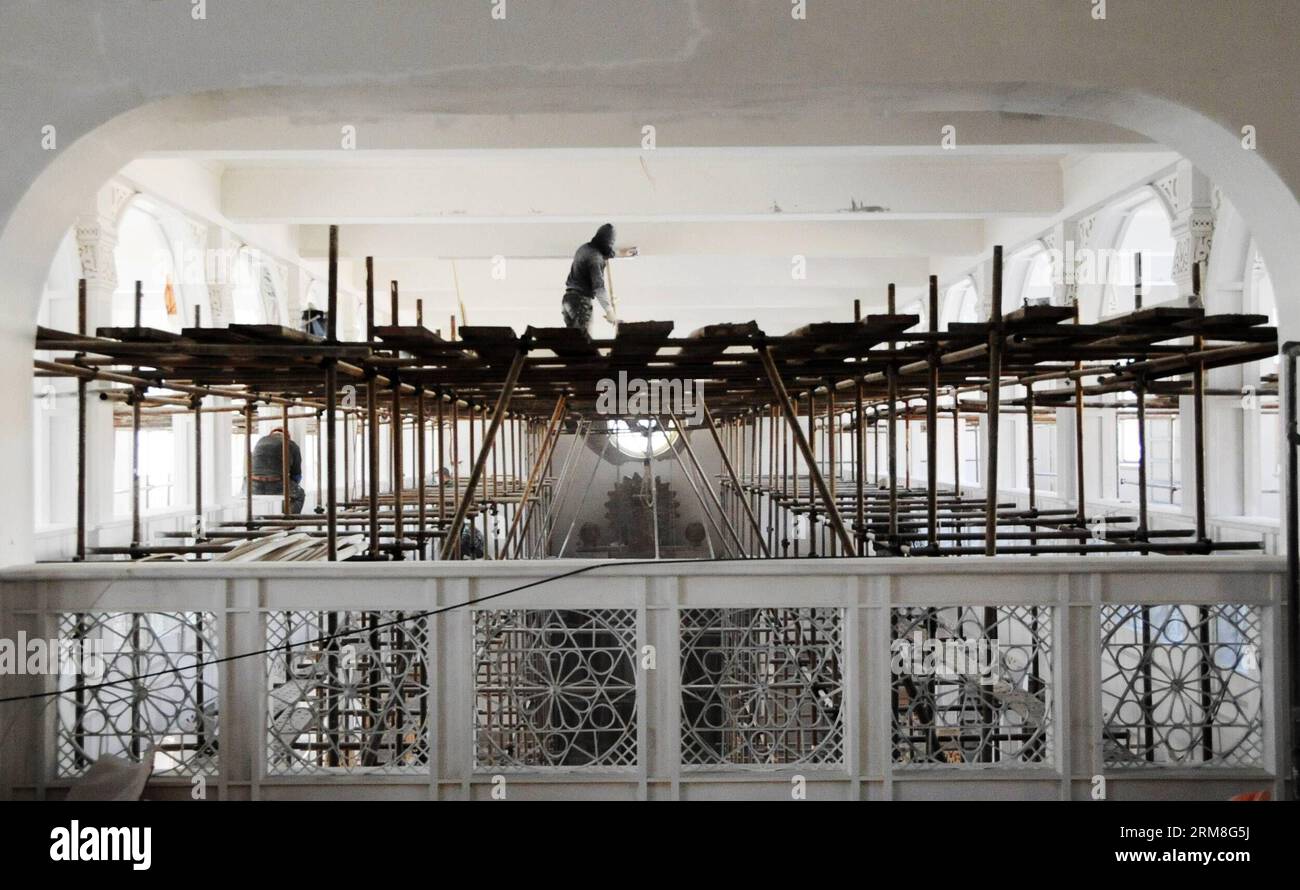 Workers restore the interior of the Old Synagogue in Harbin, capital of ...