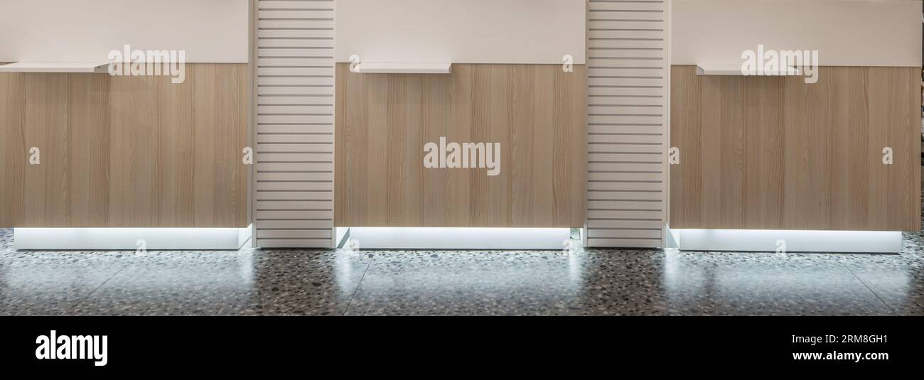 A banner with wooden counters with light in the basement and modern ...