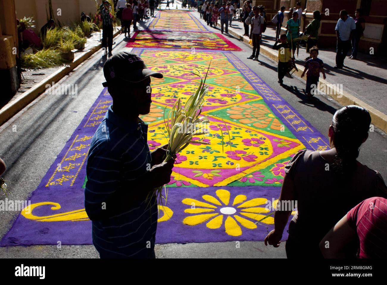 People attend San Miguel Arcangel s Cathedral for Palm Sunday ...