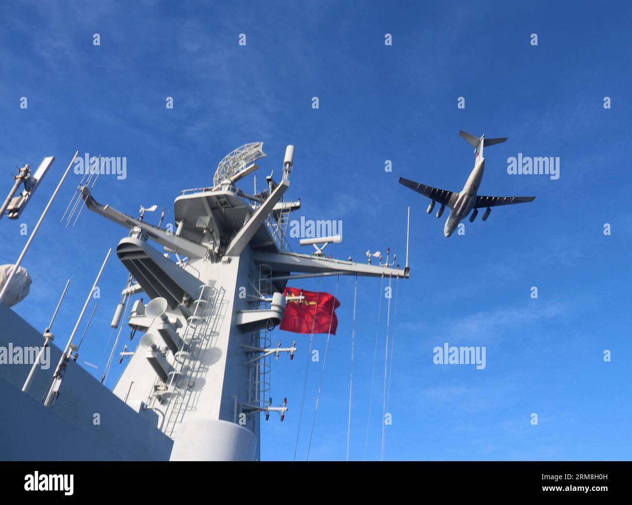 A Chinese Ilyushin IL-76 plane flies over Chinese Navy s amphibious ...