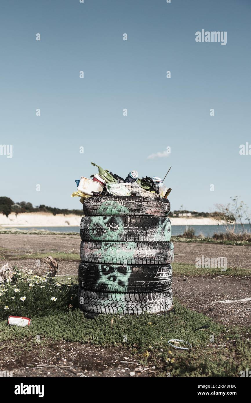 Rubbish Discarded in a Stack of Tyres, Pegwell Bay, Ramsgate, Kent, UK ...