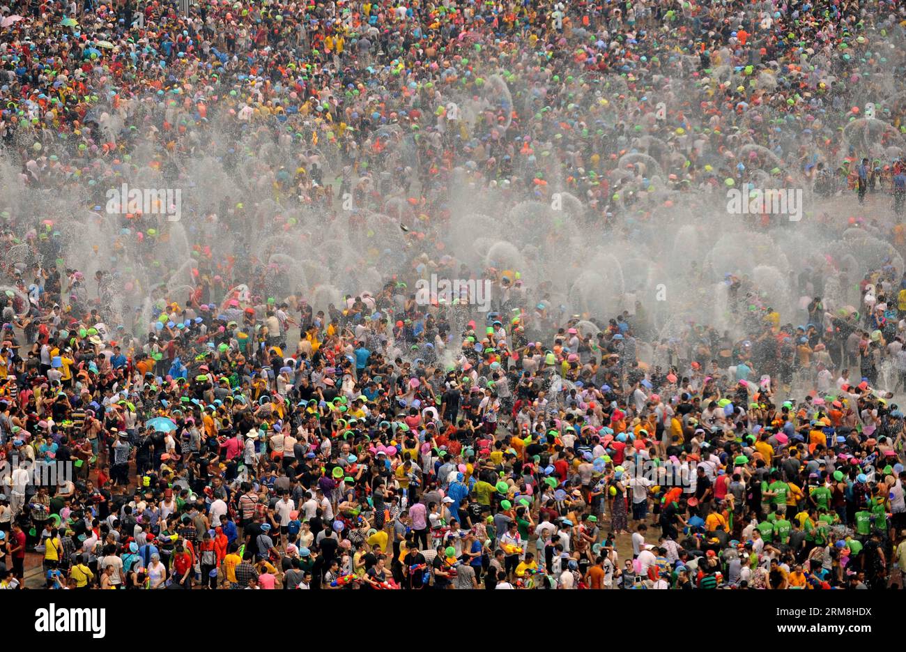Tens of thousands of locals and tourists have fun with water during the ...