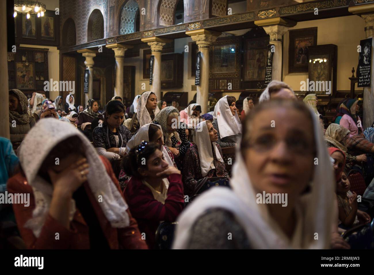 Egyptian coptic women in church hi-res stock photography and images - Alamy