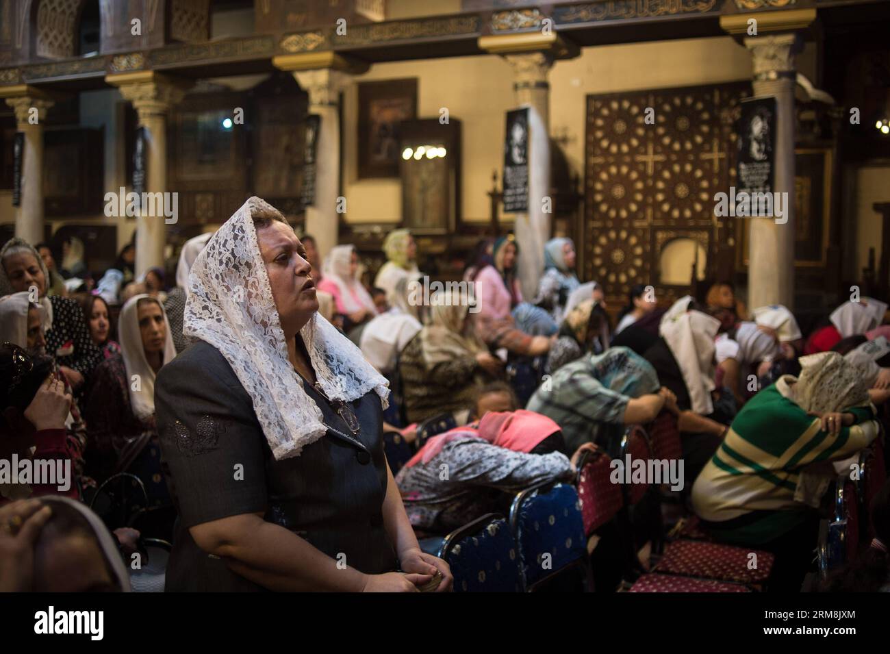 Egyptian coptic women in church hi-res stock photography and images - Alamy