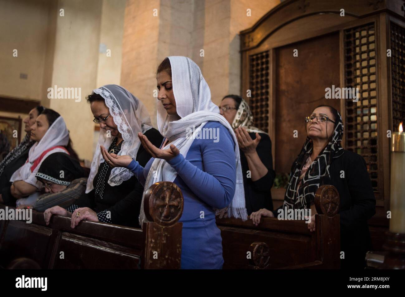 Egyptian coptic women in church hi-res stock photography and images - Alamy