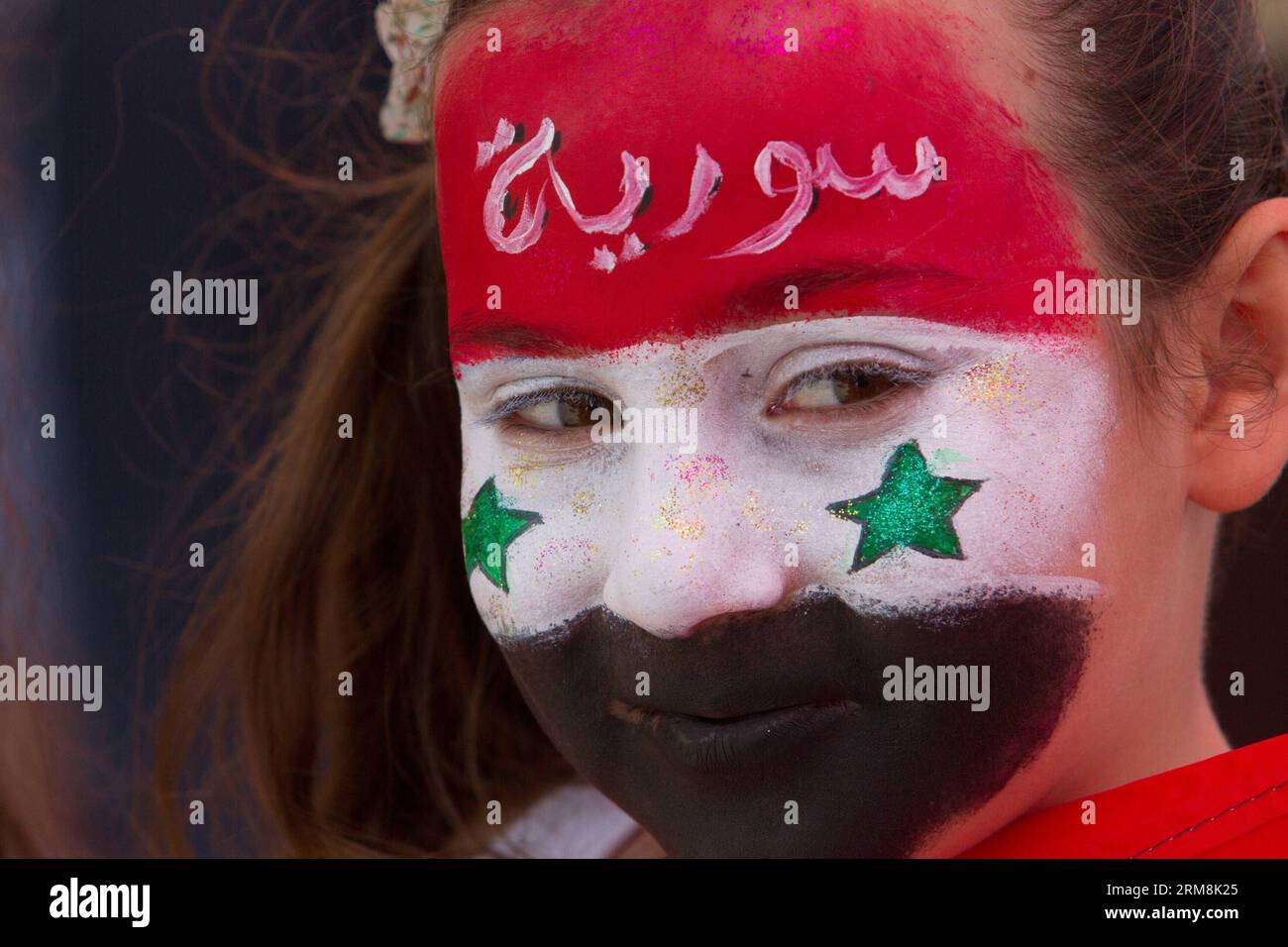A girl of the Druze community attends a rally marking Syria s ...