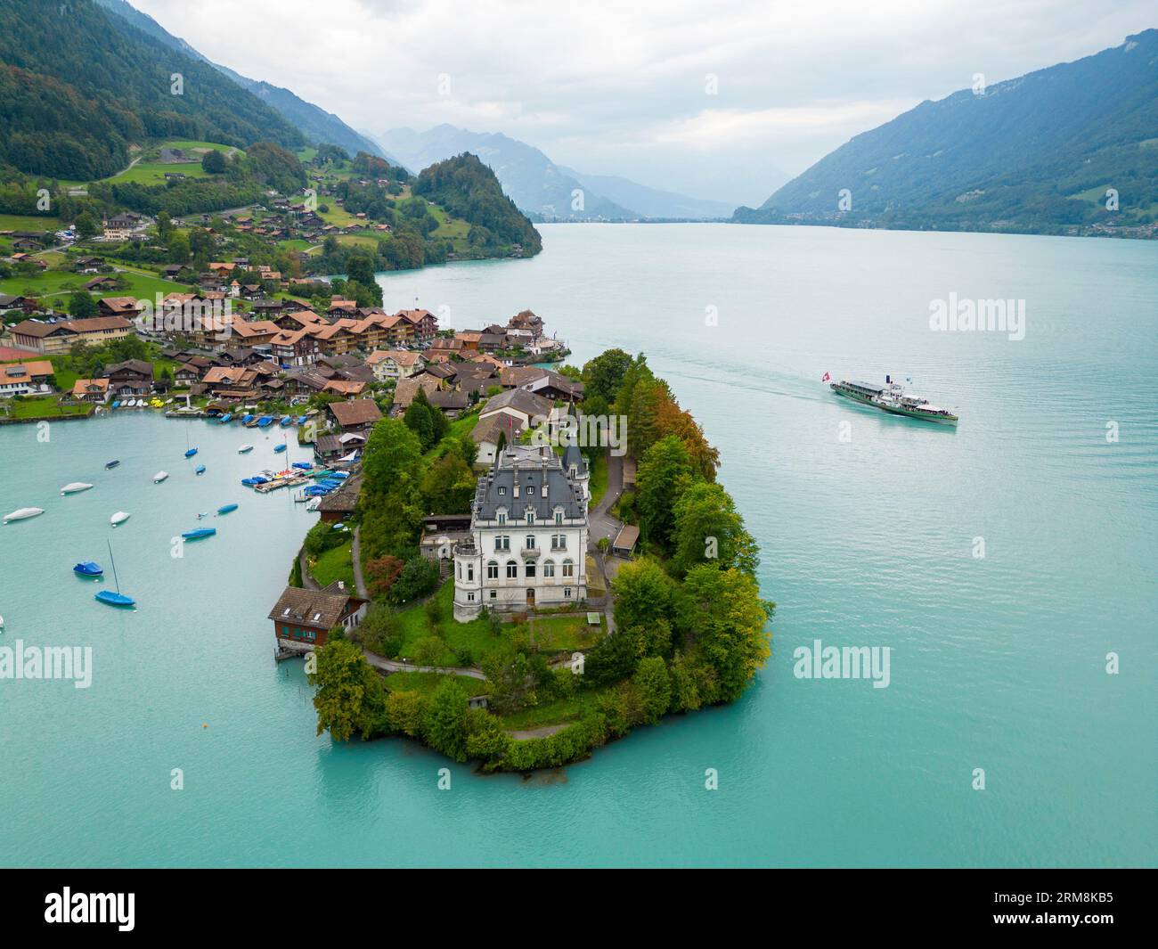 Aerial view of Iseltwald village on the southern shore of Lake Brienz ...