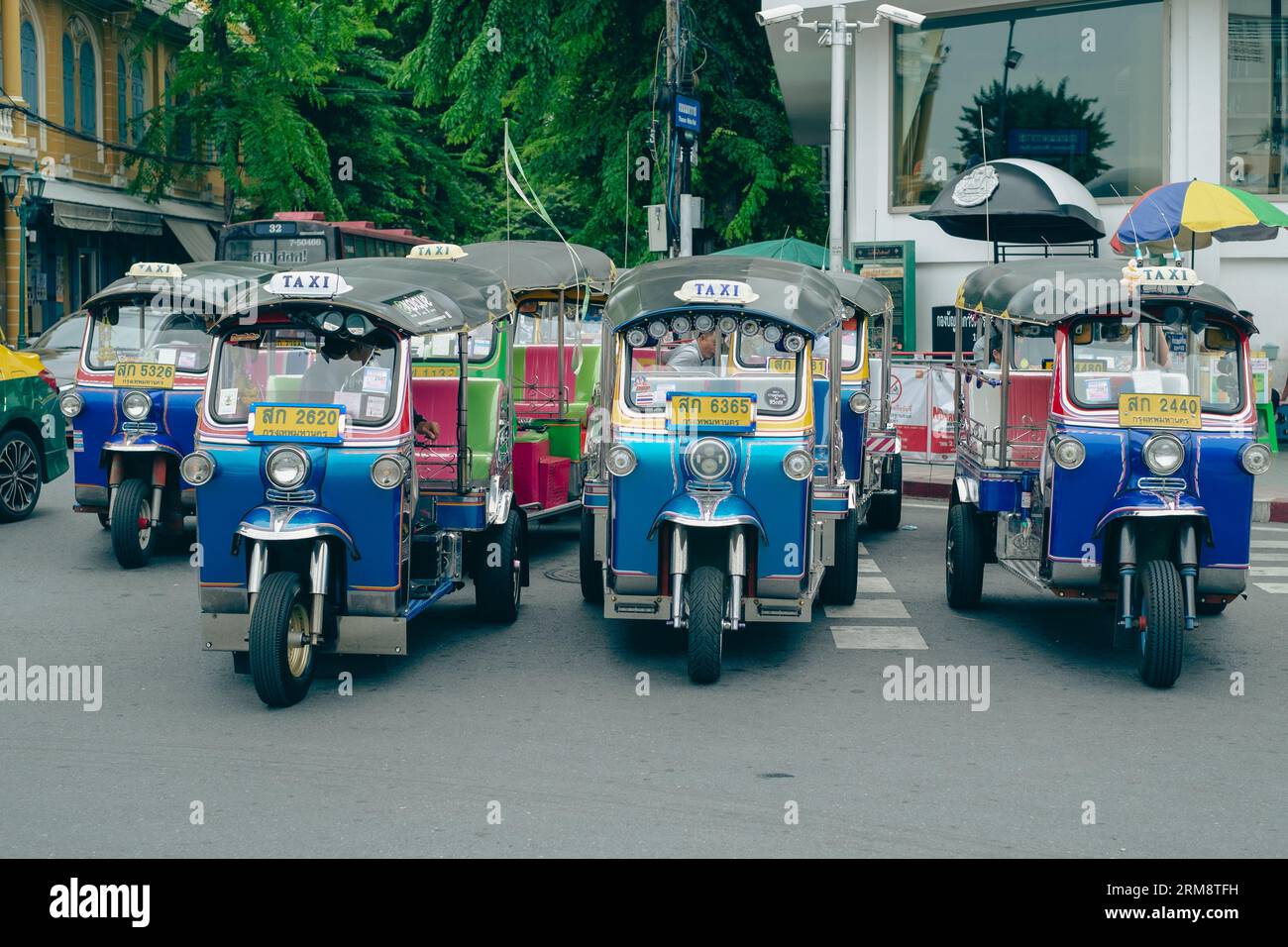 Red tram and tuk tuks hi-res stock photography and images - Alamy
