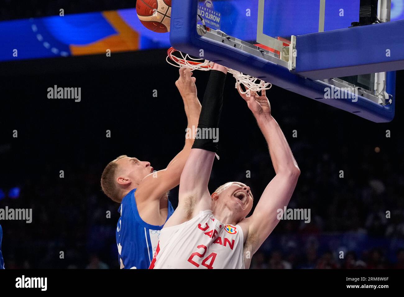 Japan center Josh Hawkinson (24) gets fouled by Finland forward Alex ...