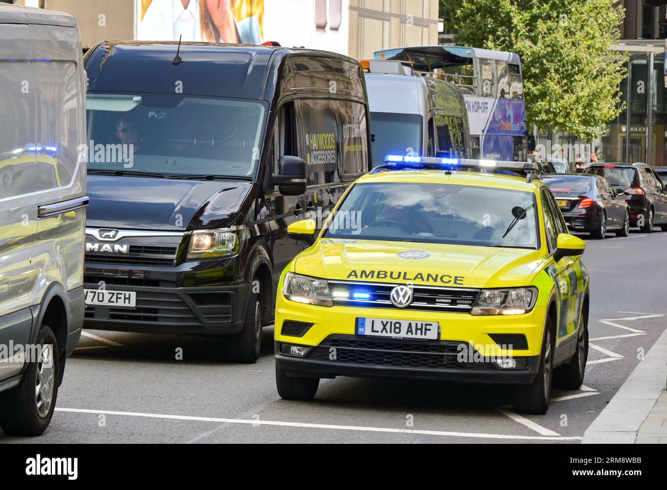 London, England, UK - 22 August 2023: Paramedic response car with blue lights flashing driving ...