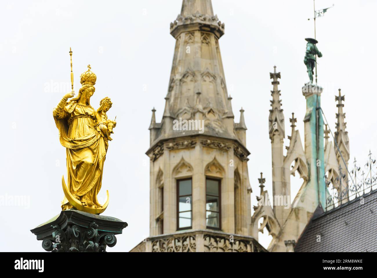 Virgin Mary statue on Marienplatz square by Town Hall, Munich, Germany ...
