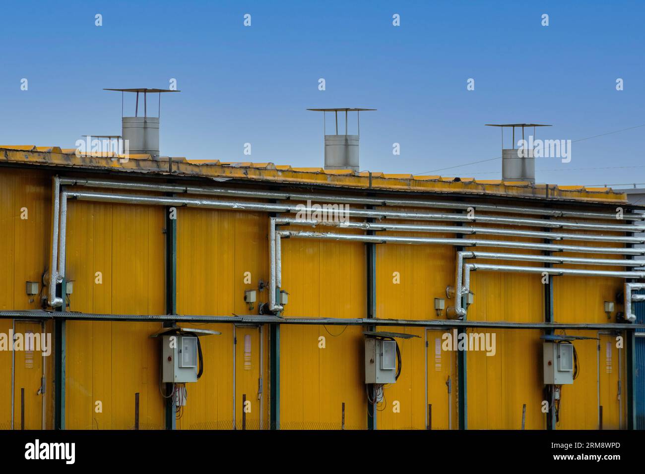 industrial building with pipes on it Stock Photo - Alamy