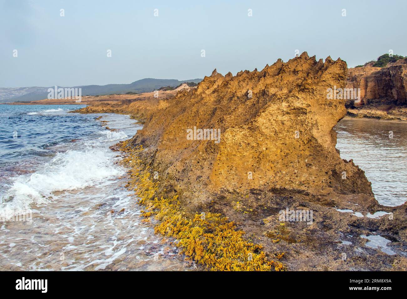 Harmony of Land and Sea: Rimel's Mountainous Landscape Meets Tranquil ...