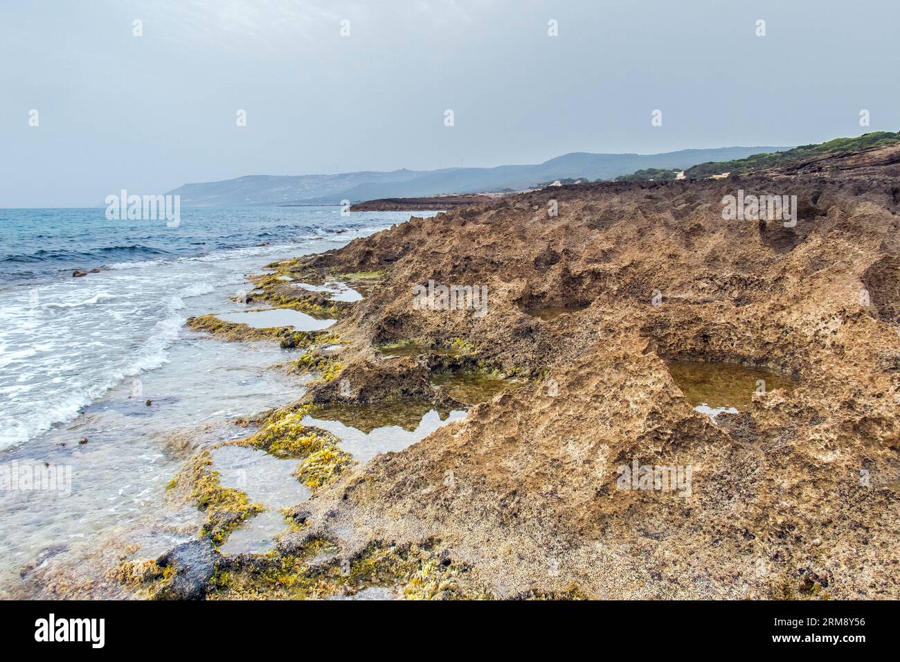 Harmony of Land and Sea: Rimel's Mountainous Landscape Meets Tranquil ...