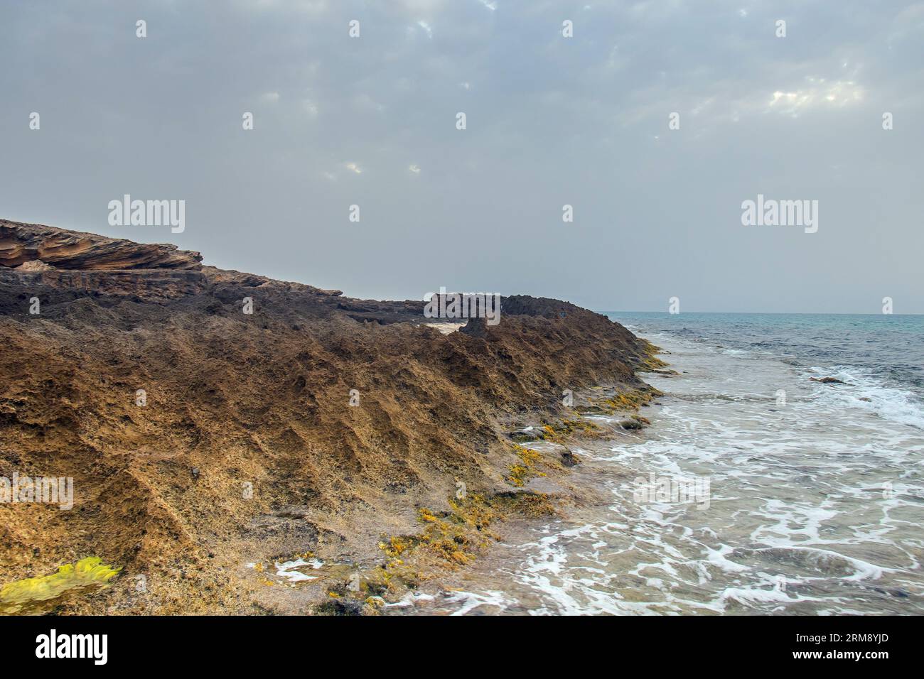 Harmony of Land and Sea: Rimel's Mountainous Landscape Meets Tranquil ...