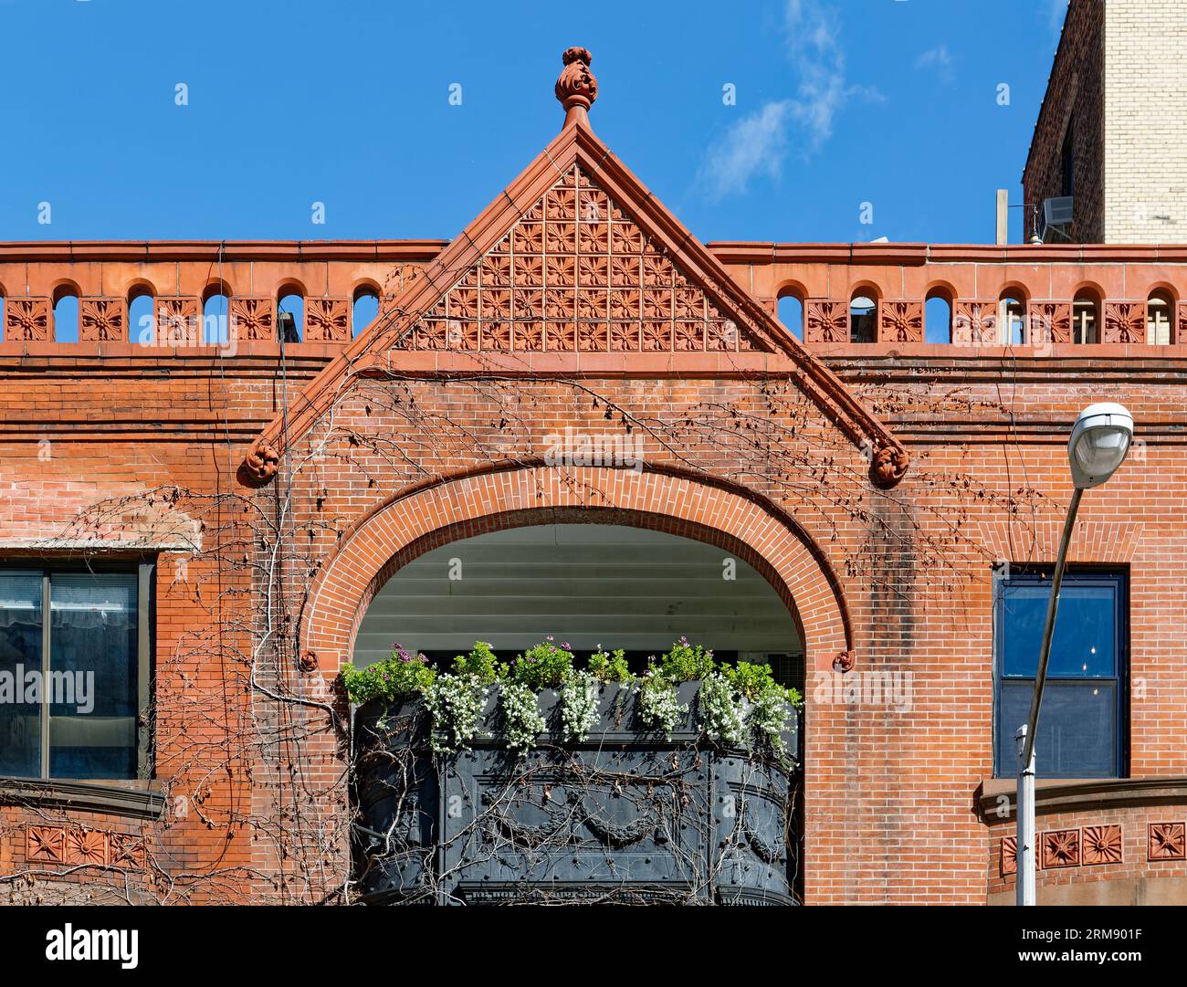 Upper West Side: Arches and oriels, in Queen Anne-styled brick, stone ...