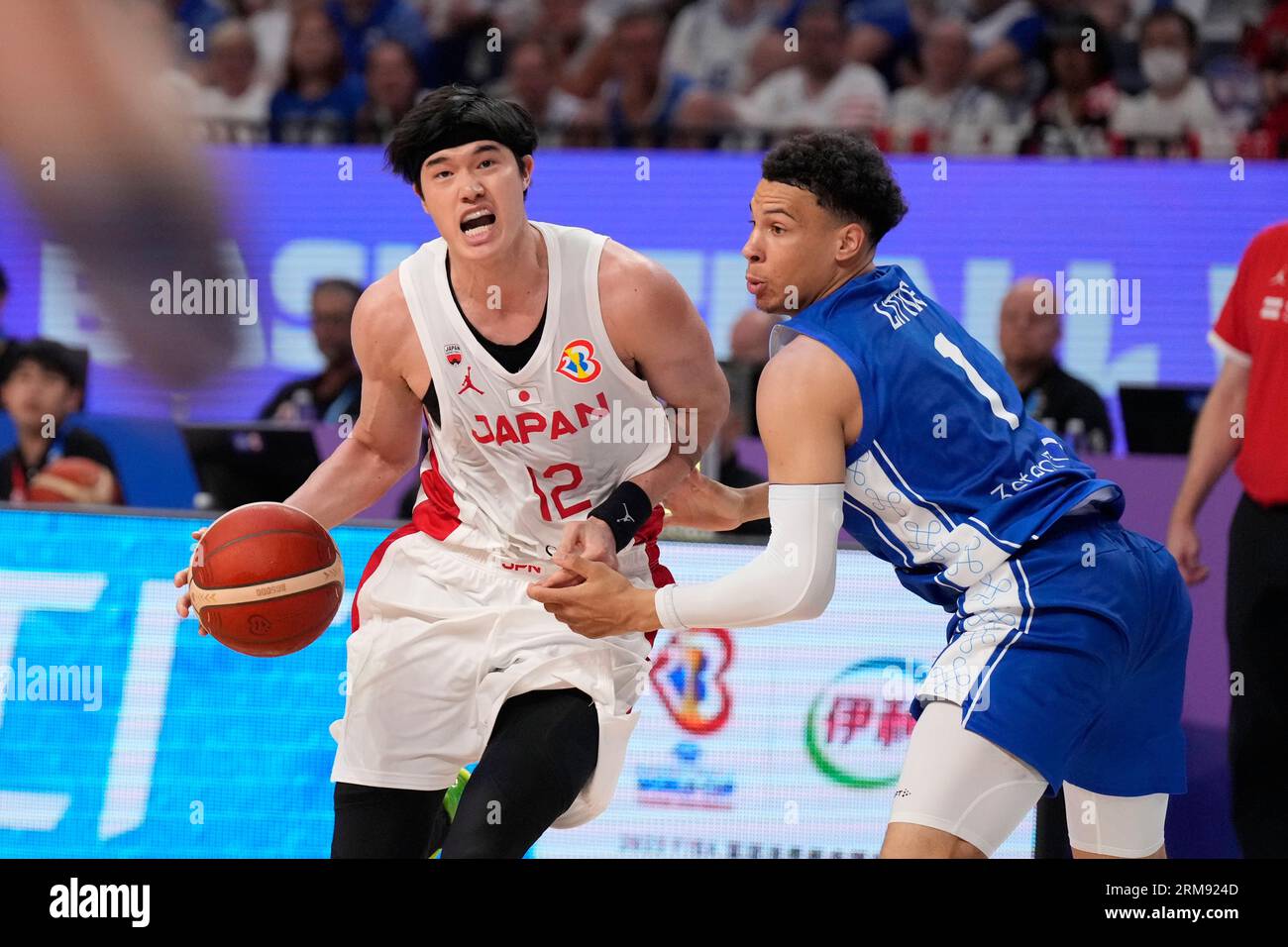 Japan forward Yuta Watanabe (12) drives against Finland guard Miro ...