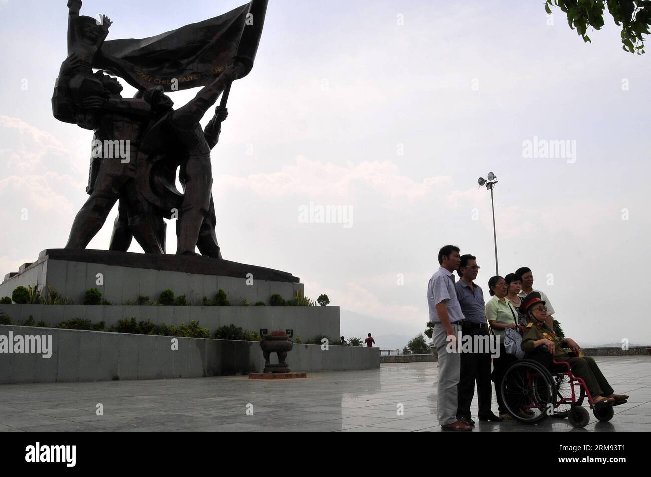 This photo taken on May 5, shows a veteran posing for a photo with his ...