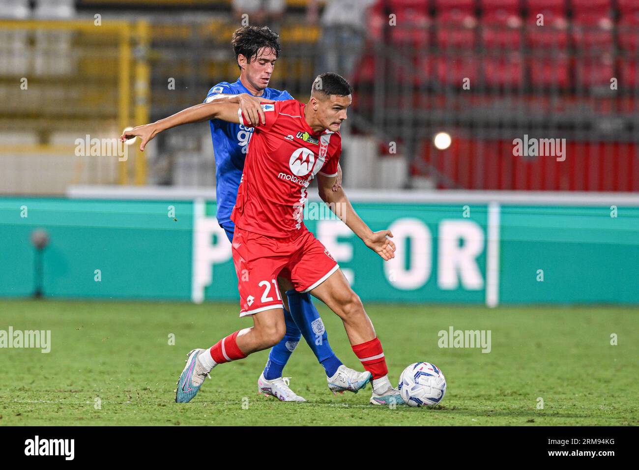 Stiven Shpendi (7 Empoli FC) and Valentin Carboni (21 AC Monza) during ...