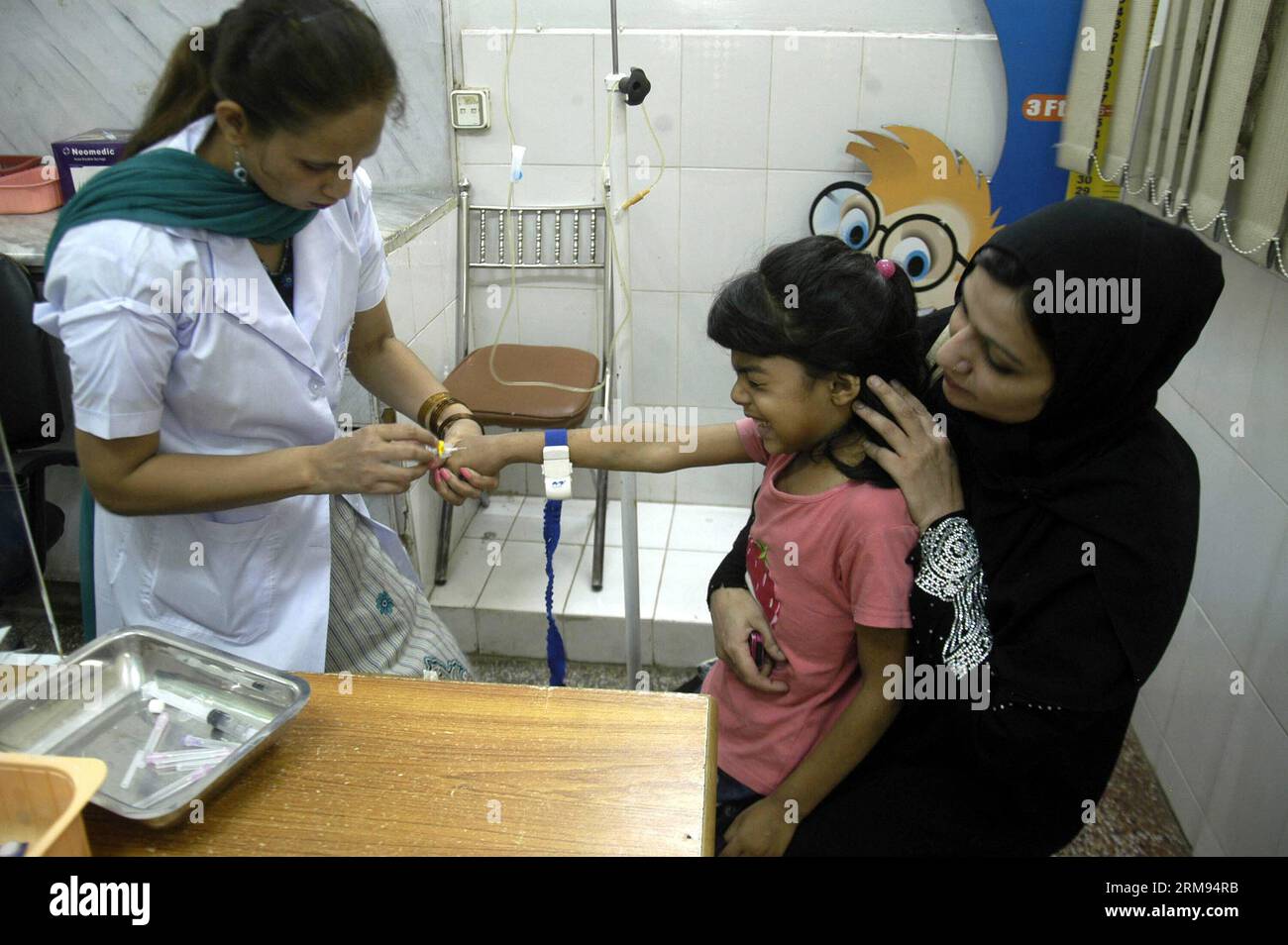 (140507) -- LAHORE, May 7, 2014 (Xinhua) -- A Pakistani patient ...