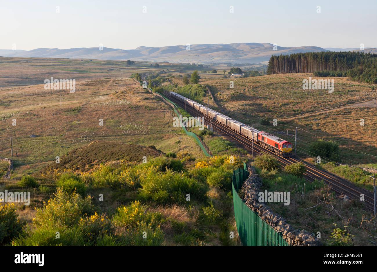 DB cargo Class 66 locomotive on the west coast main line in Cumbria at ...
