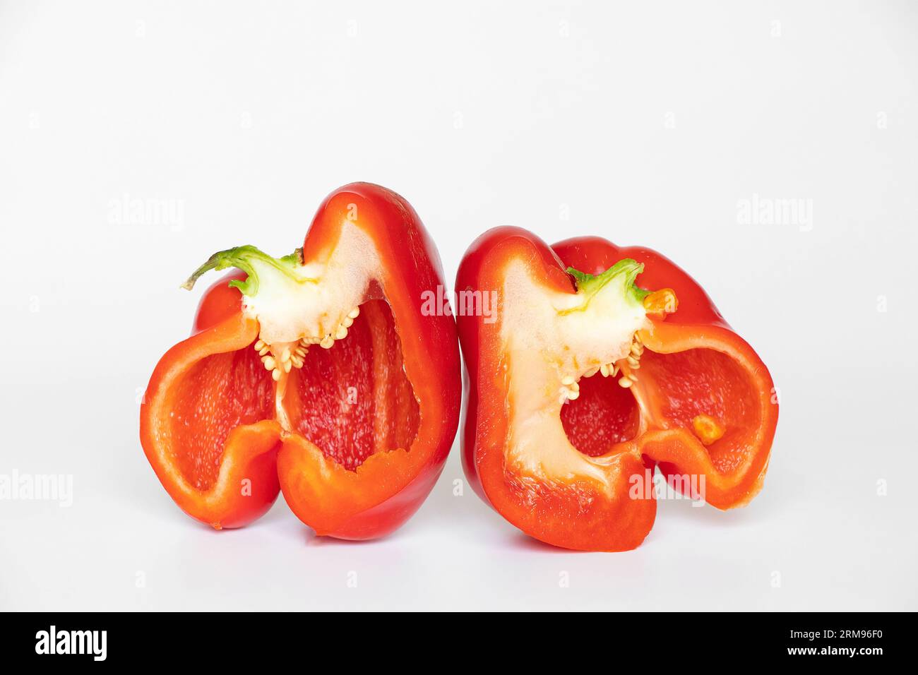 Red capsicum pepper cut in half hi-res stock photography and images - Alamy