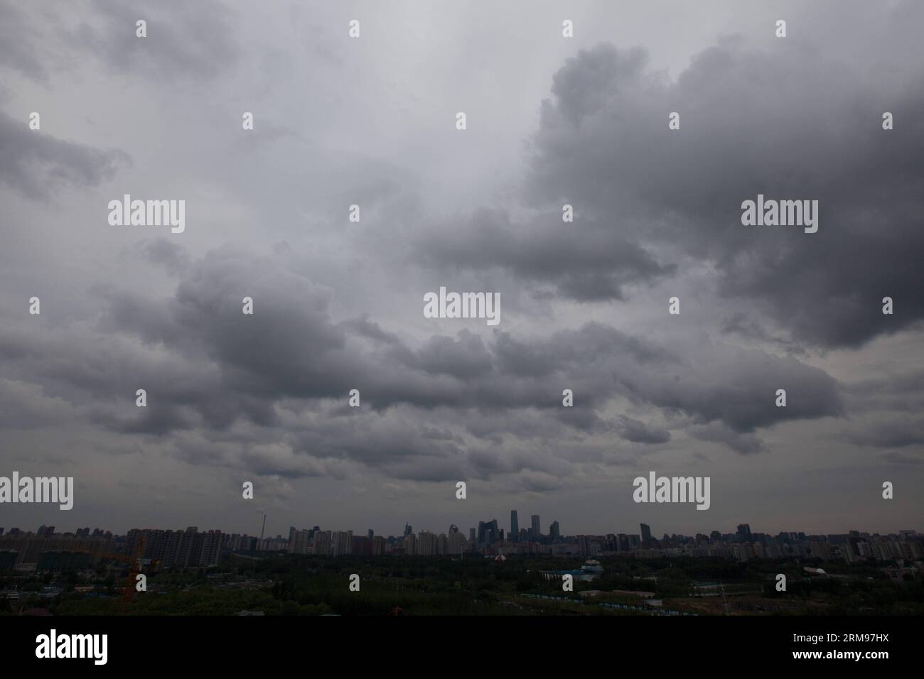 Photo taken on May 11, 2014 shows a view after rain of an urban area in ...