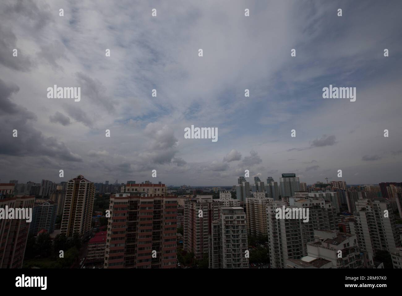 Photo taken on May 11, 2014 shows a view after rain of an urban area in ...
