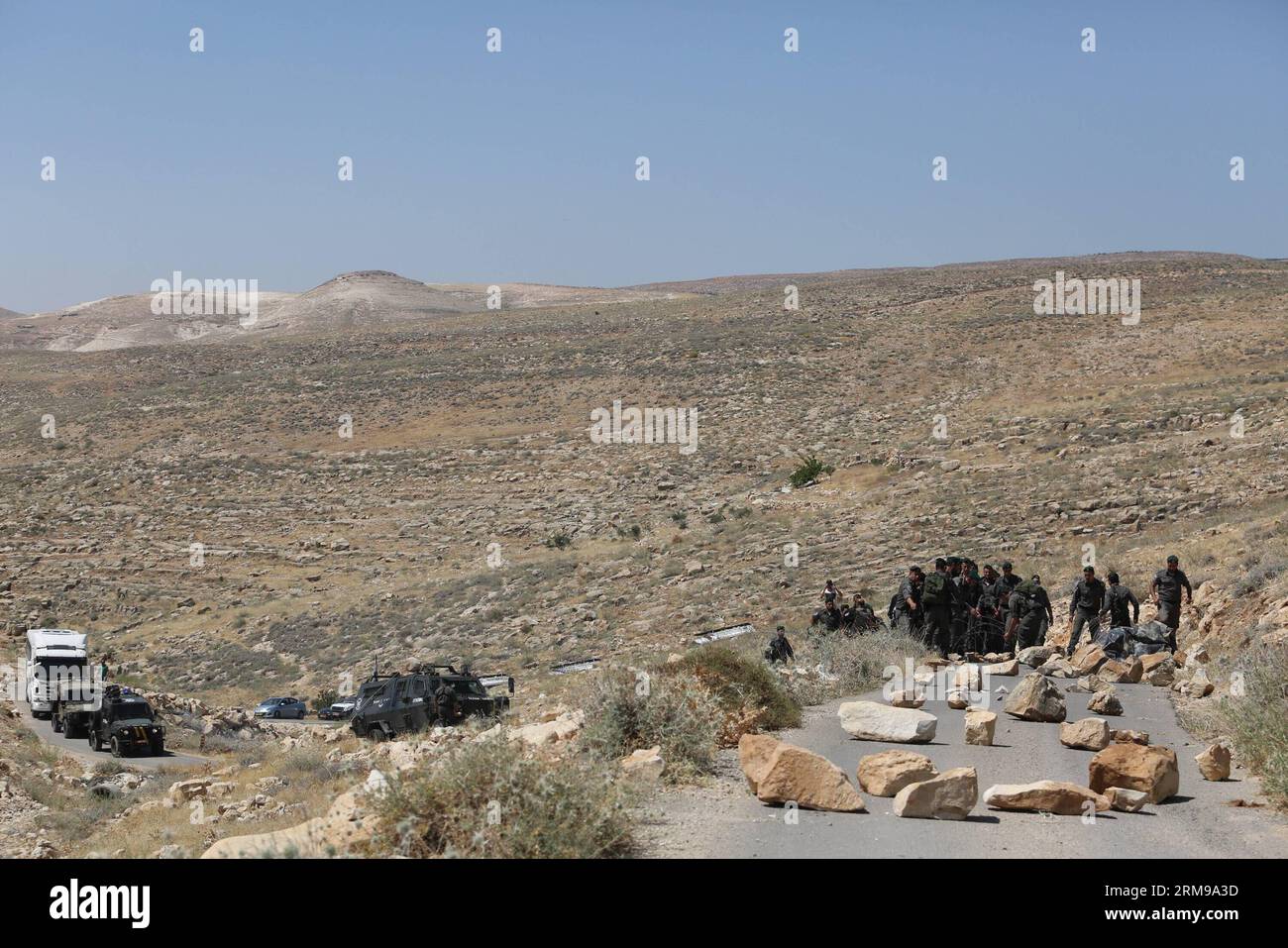 JERUSALEM, May 14, 2014 - Israeli policemen are blocked with barricades ...