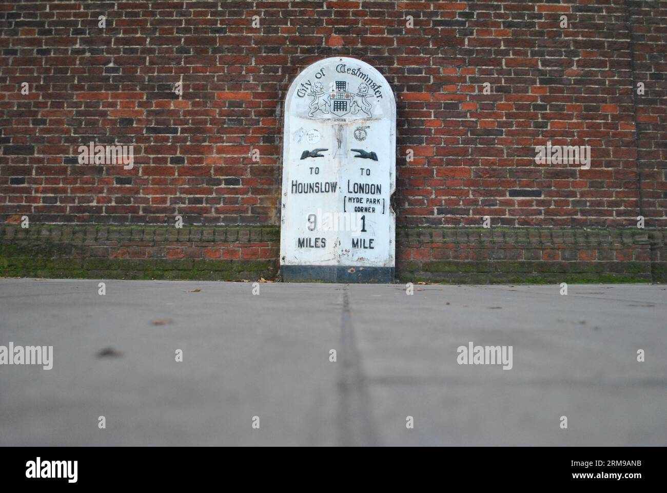 City of Westminster milestone featuring pointing fingers to Hounslow ...