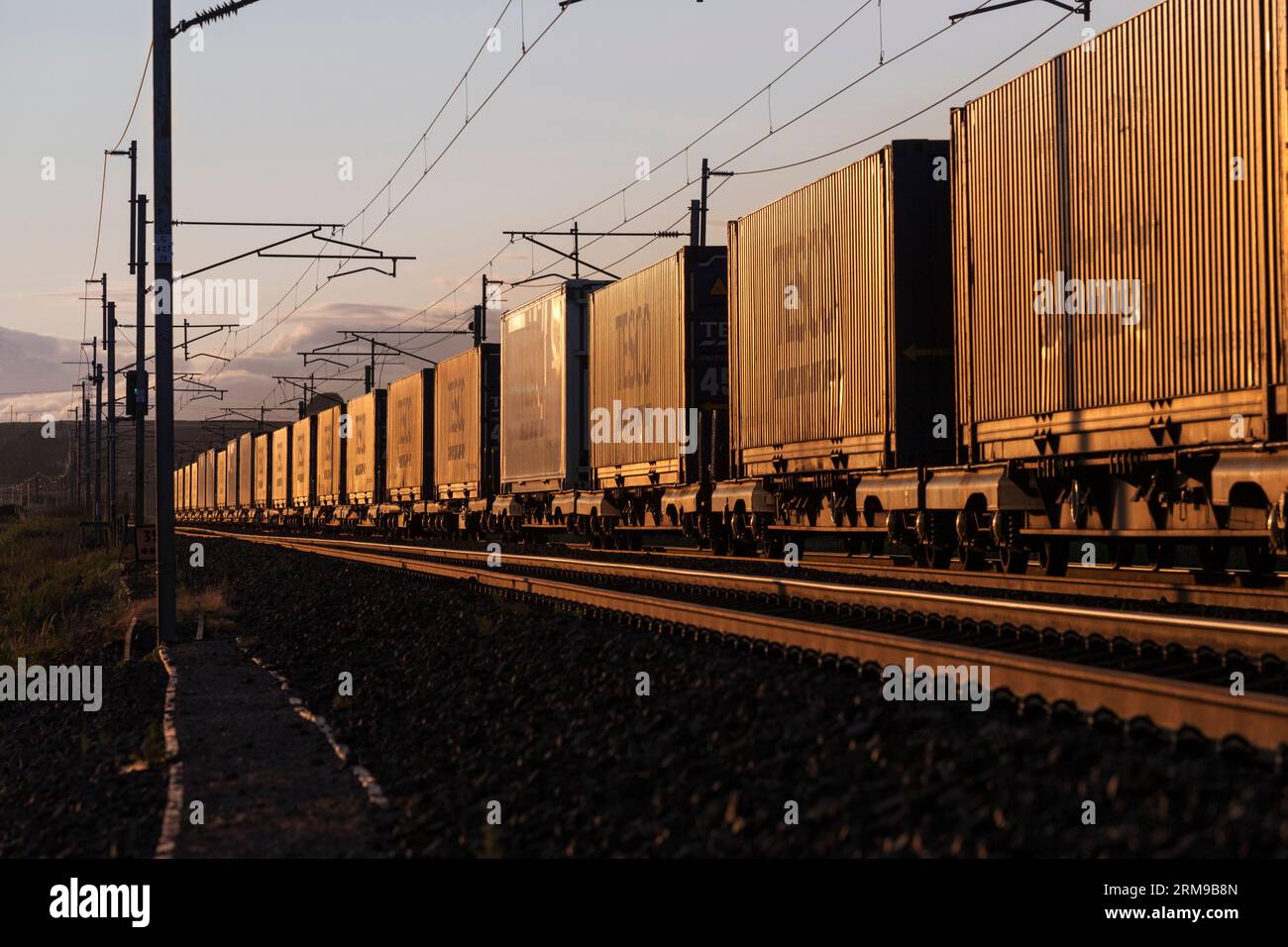 Freight train carrying intermodal containers on the west coast mainline ...