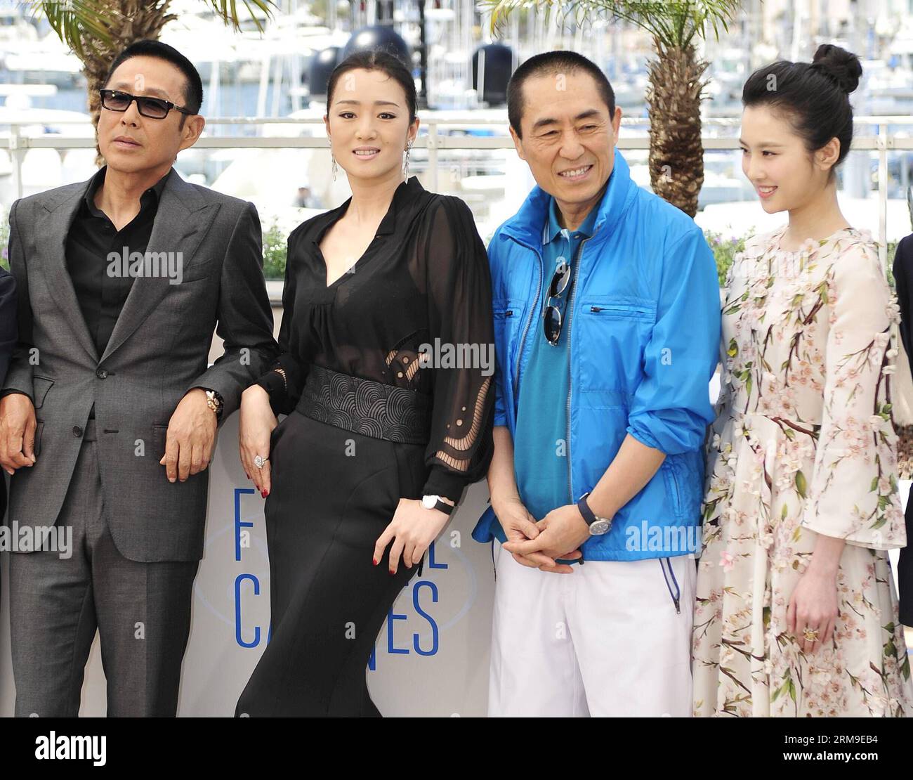 (140520) -- CANNES, May 20, 2014 (Xinhua) -- (From L to R) Actor Chen ...