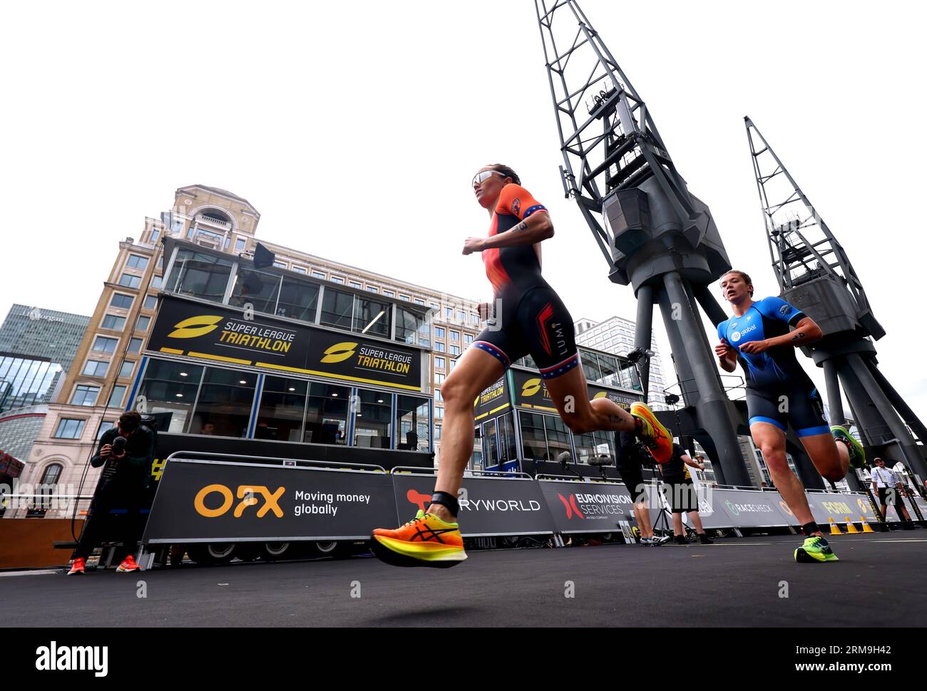 Taylor Spivey (left) in action as she competes in the Women's Race ...