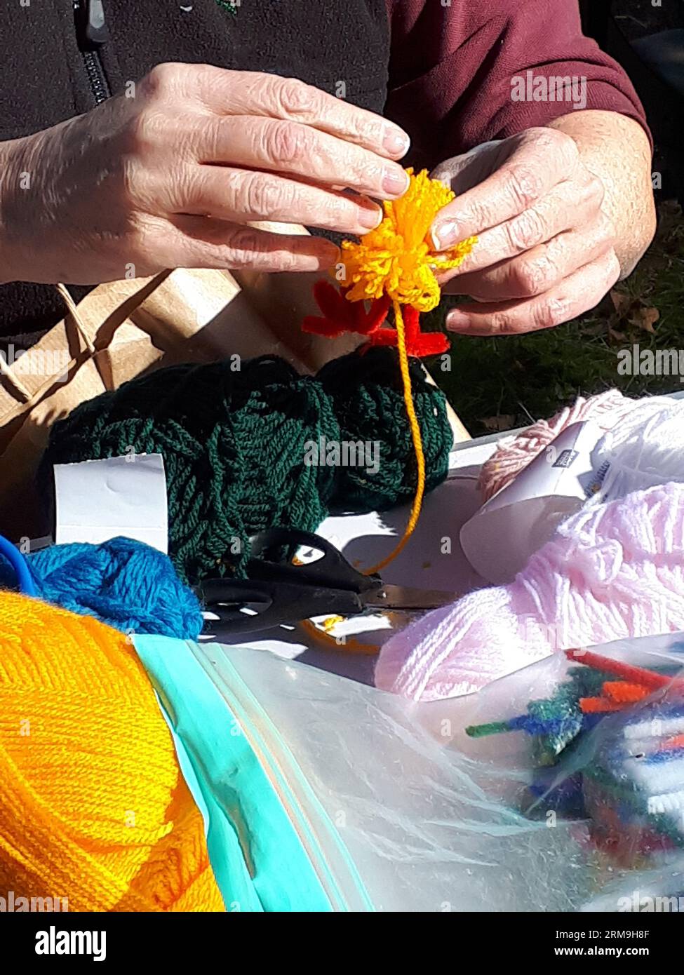 A women's hands with craft products at a demonstration at a craft ...
