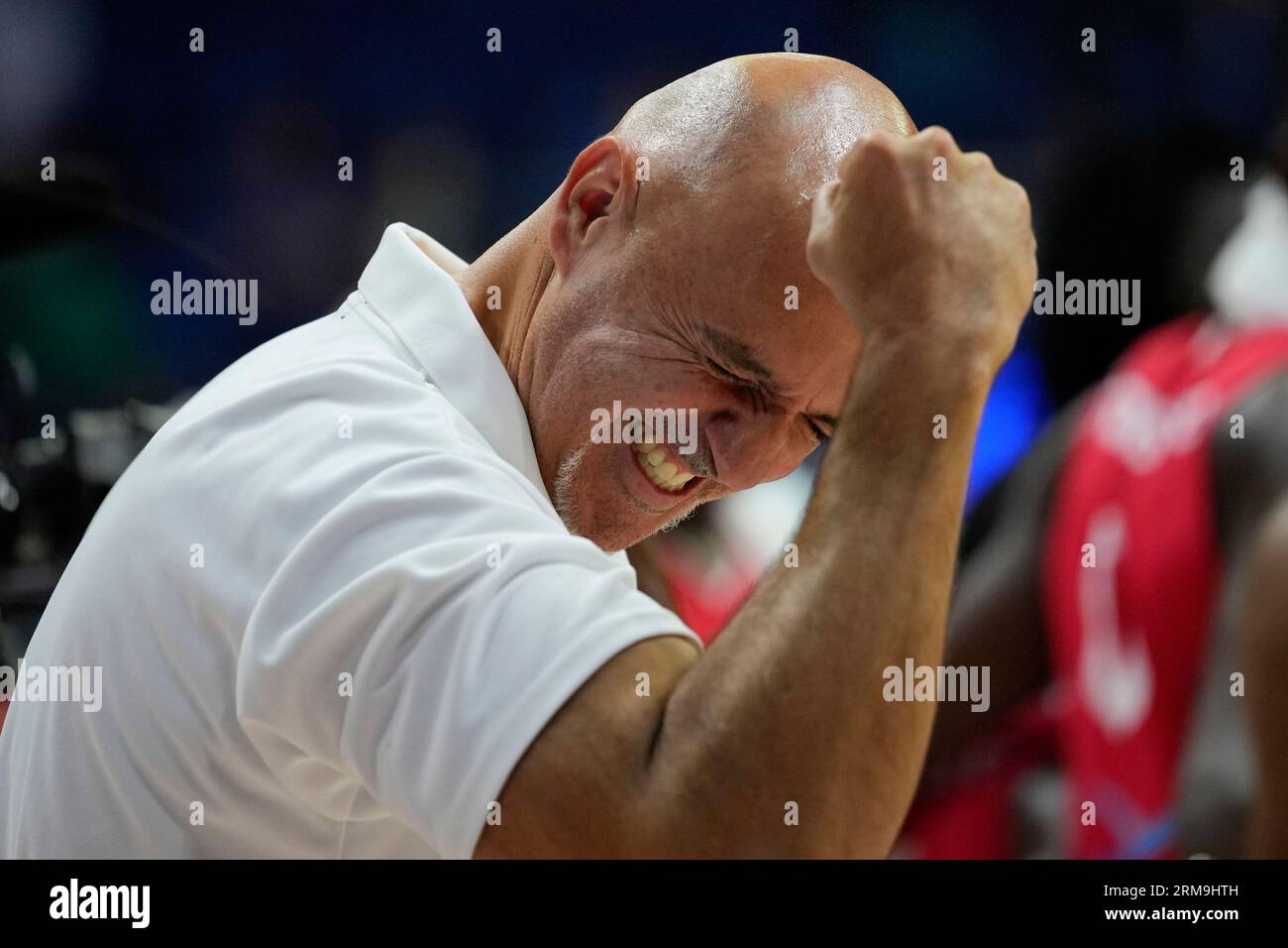 Angola coach Jose Claros Canals celebrate after their win against the ...