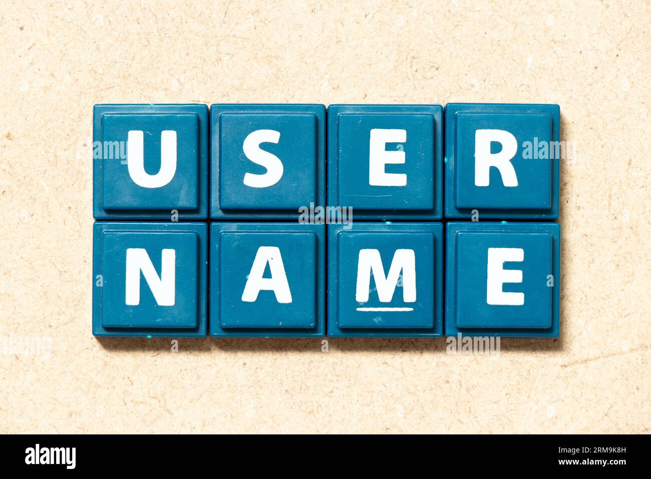 Tile alphabet letter in word username on wood background Stock Photo ...