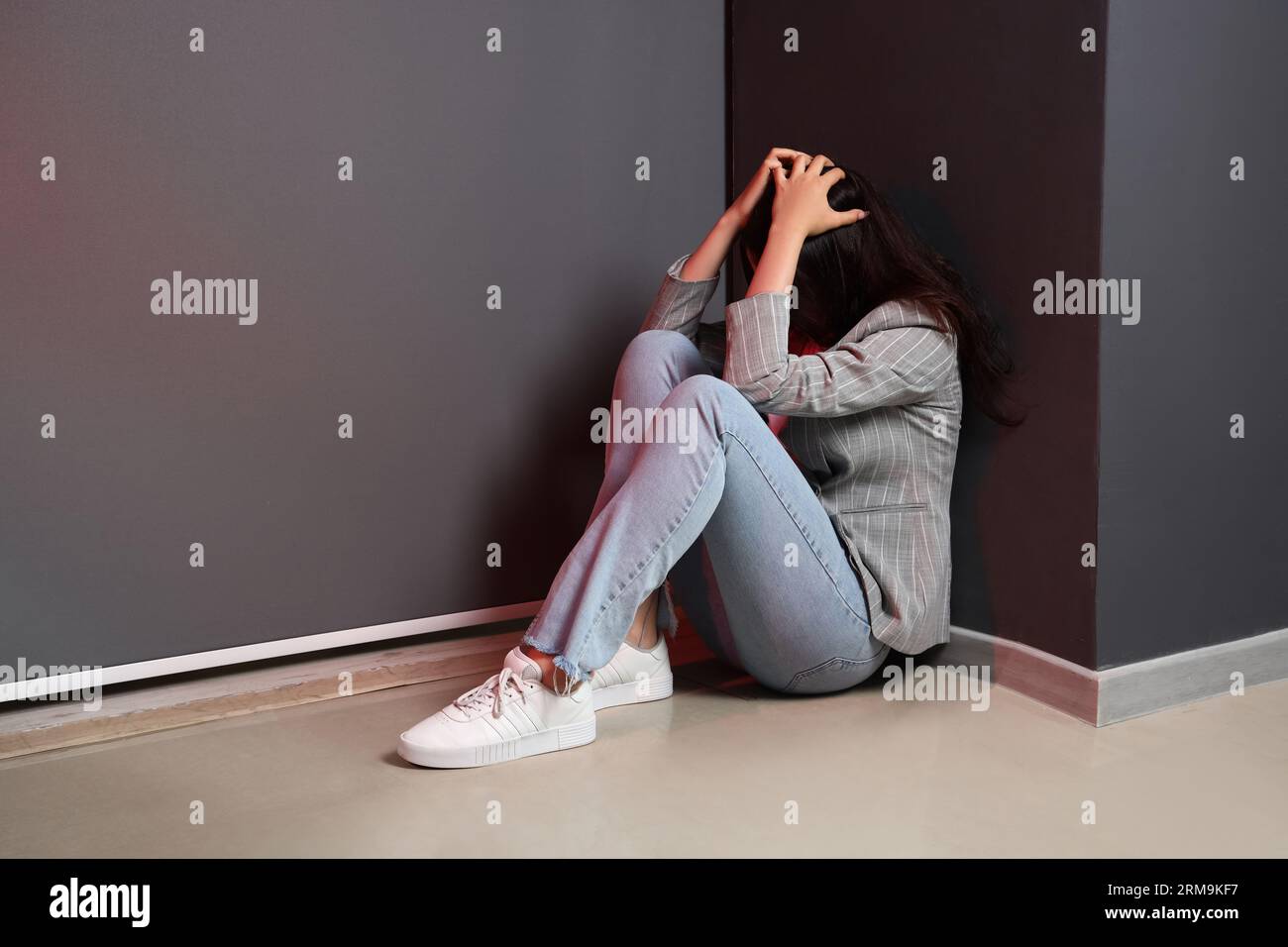 Female office worker having panic attack indoors Stock Photo - Alamy