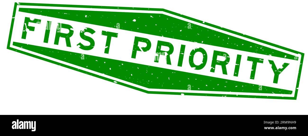 Grunge green first priority word hexagon rubber seal stamp on white ...